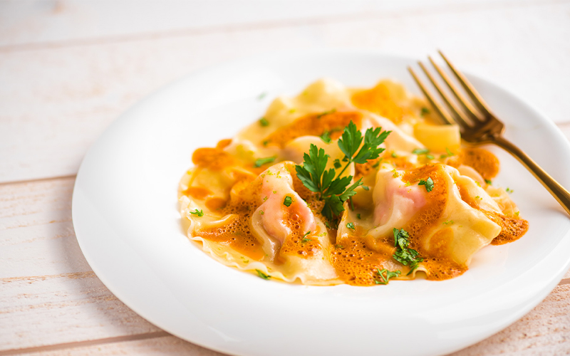 Ravioles de langoustines à l’émulsion de bisque de homard